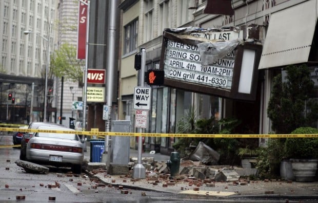 Falling facade injures three in Seattle