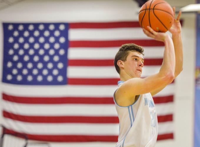 Boys' Basketball: Shorthanded Monarchs fall to Timberline