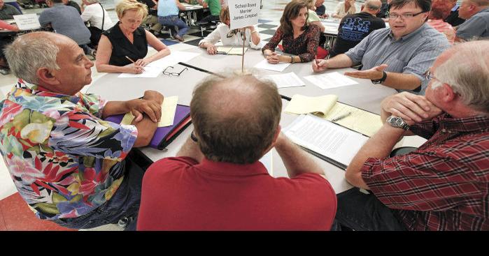 Longview School Board has a stack of merger plans to study