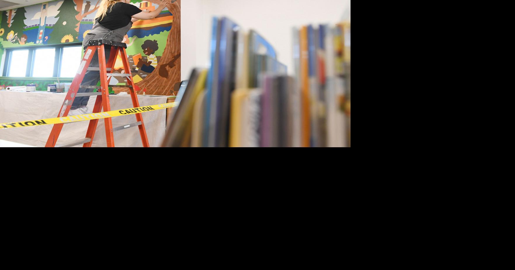 Kalama artist brightens library with children's section mural