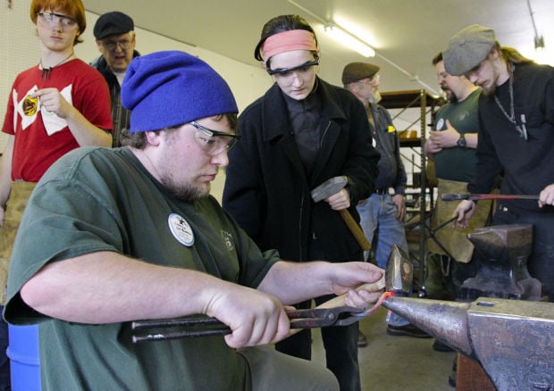 Forging Friendships: Sparks fly during gathering of blacksmiths