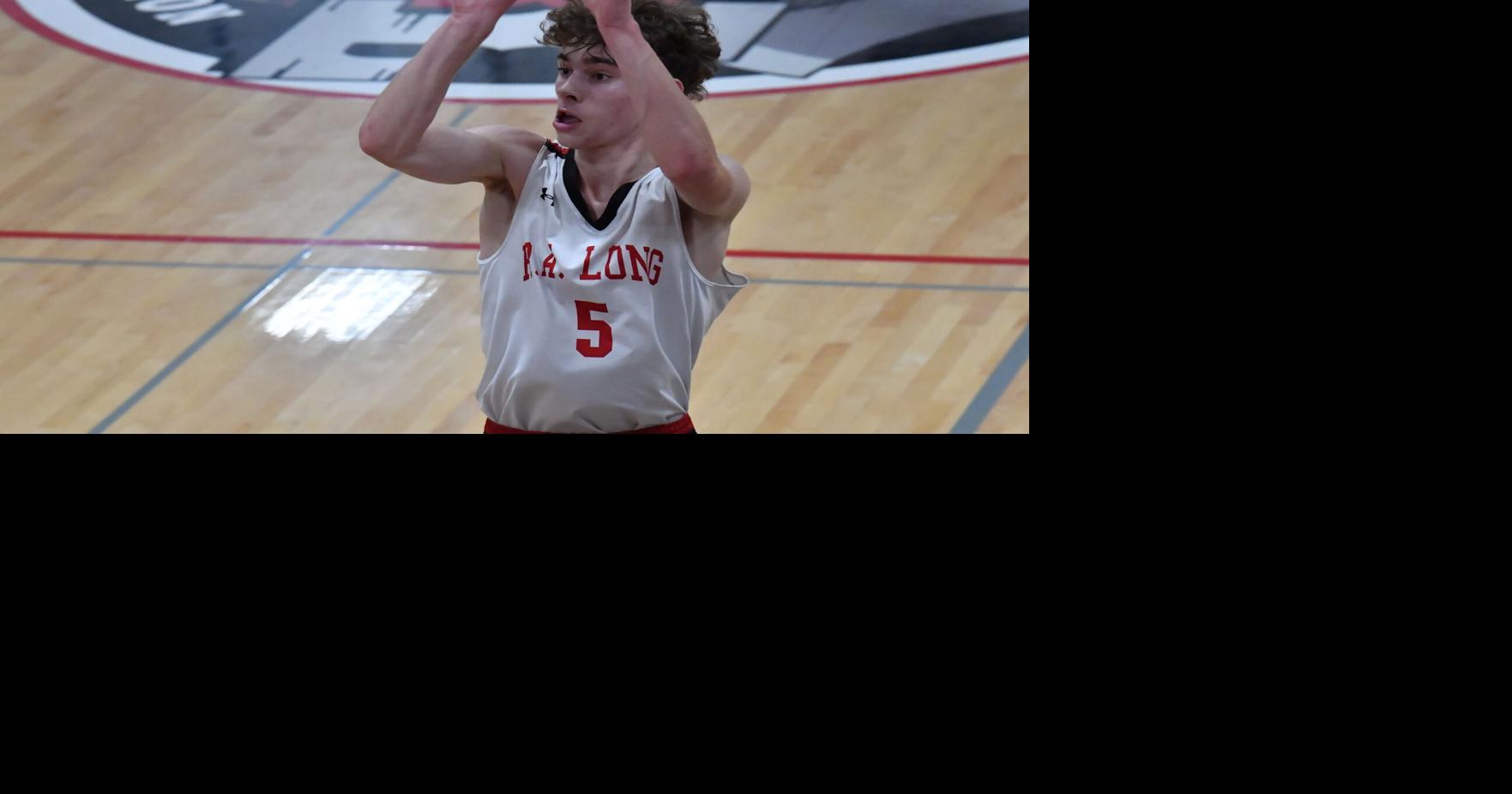 PHOTOS: R.A. Long boys basketball season opener versus Montesano