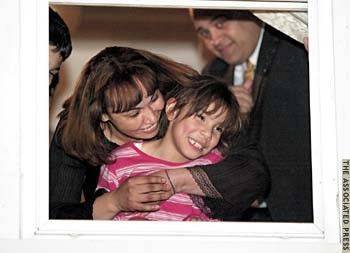 Mom gets daughter back 6 years after arson, kidnap