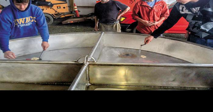 Long Beach cooking up fun, clam fritters in giant frying pan