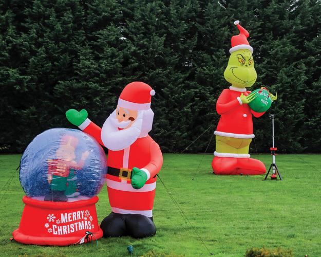 Woodland couple to give away most of 80 inflatable Christmas displays