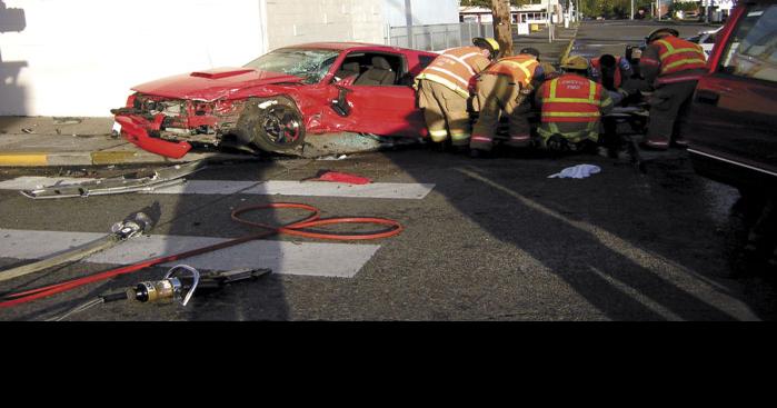 Crews cut man out of car after accident in Longview