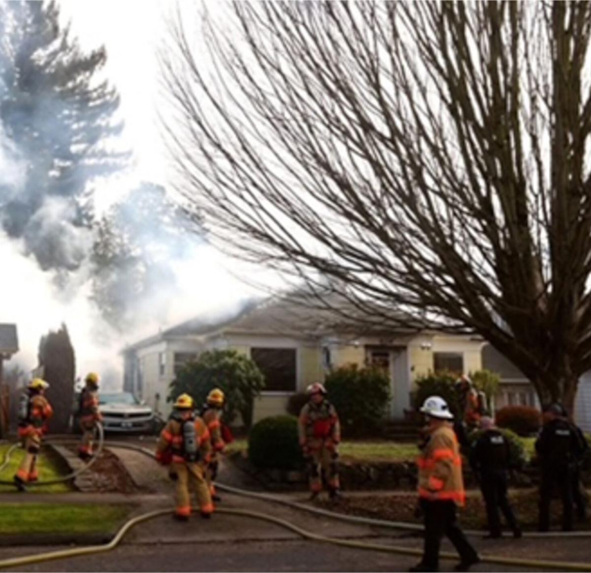 Longview fire destroys garage, vehicle