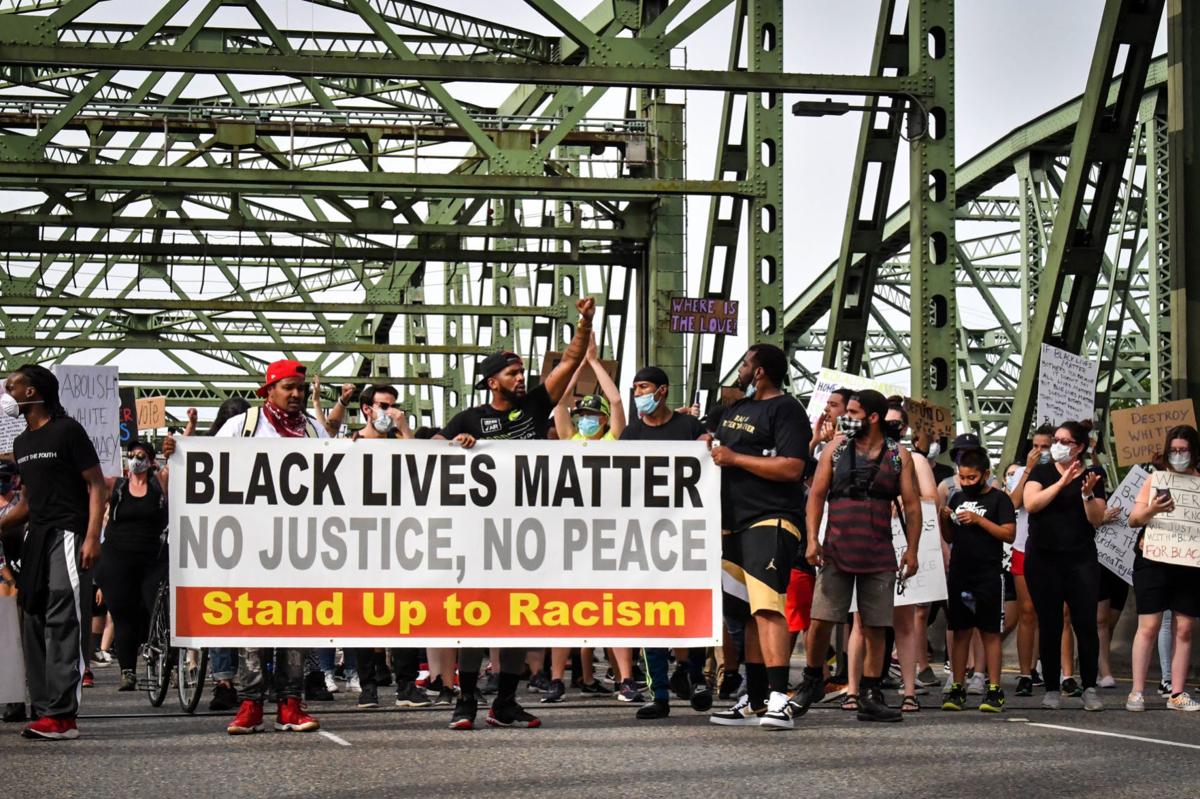 Protesters shut down southbound span of Interstate Bridge to demand ...