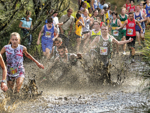 Gluttons for punishment: Cross country runners hit Three Course Challenge