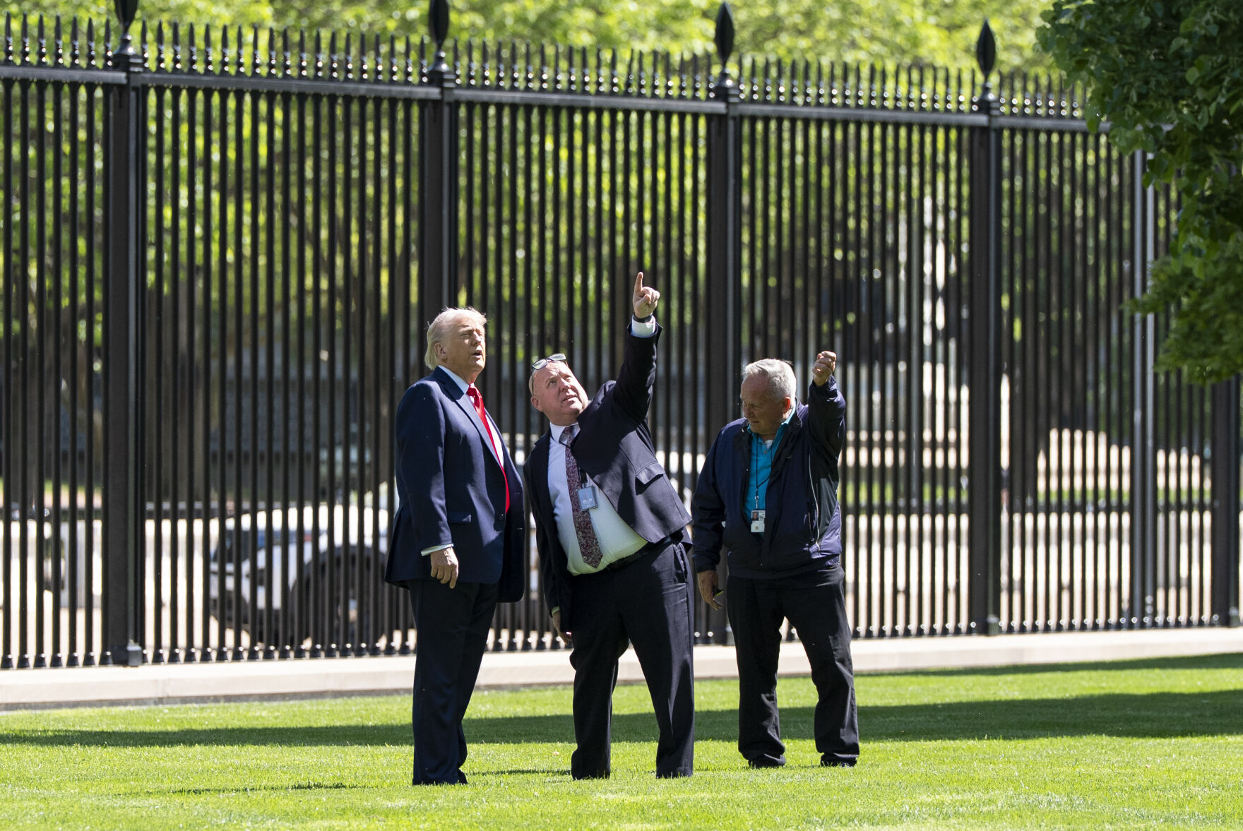 Trump adding flag poles, paving some lawn at White House