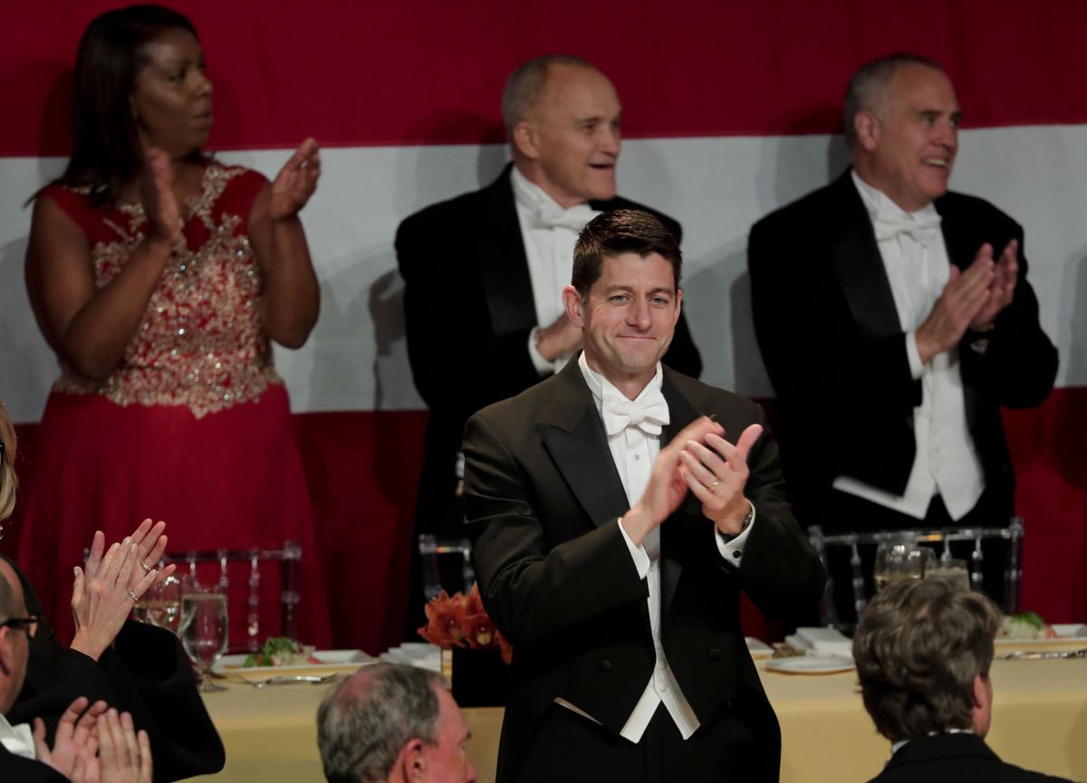 A look at Paul Ryan's jabs at Trump, Democrats at Al Smith dinner