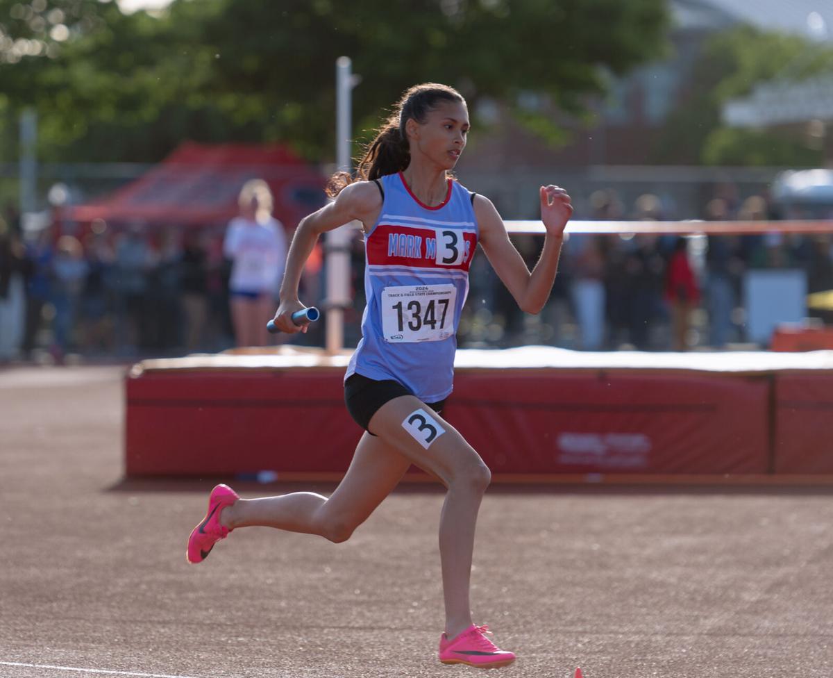 R.A. Long's Chapin wins shot put title at State meet