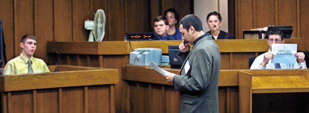 Area students study the courtroom with mock trial