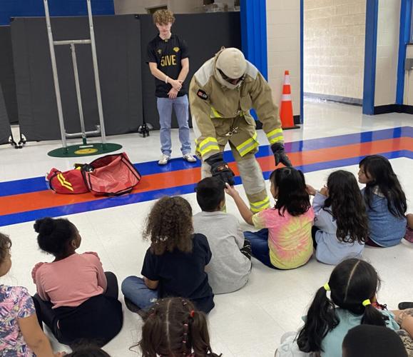 LSHS students learn community involvement teaching fire safety ...