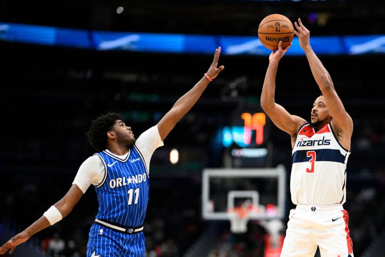 CJ McCollum steadies Wizards in 4th quarter of 120-112 win over Magic ...