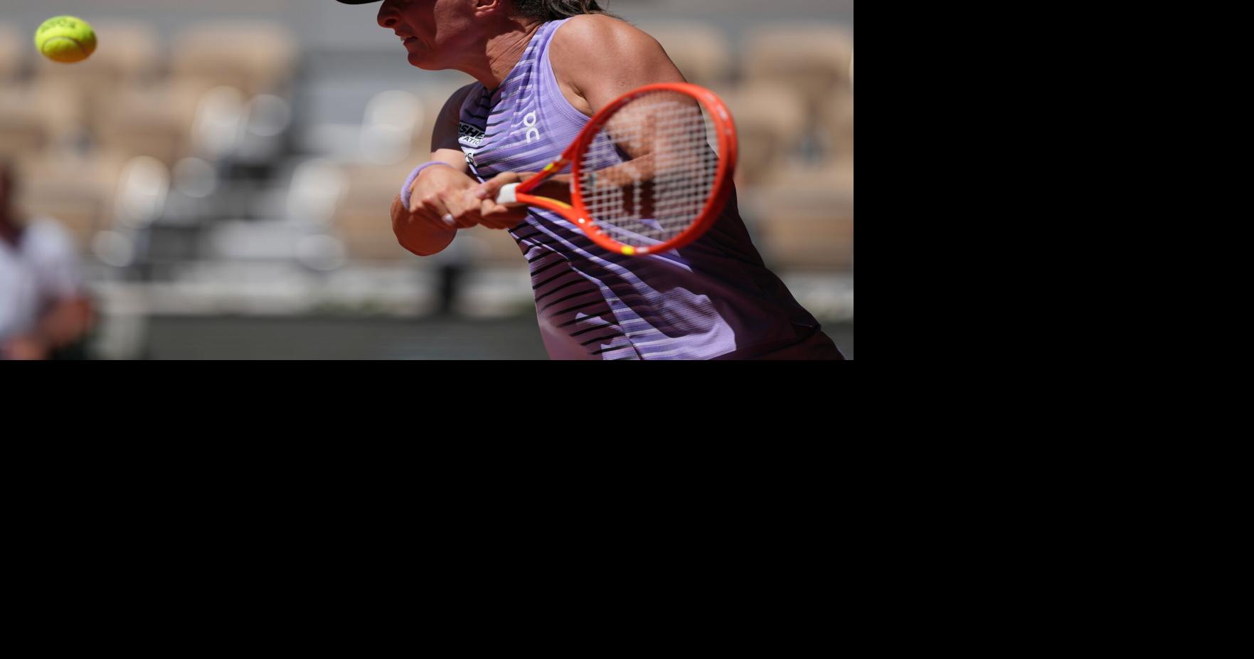 Iga Swiatek improves career record at French Open to 42-3 as she ...