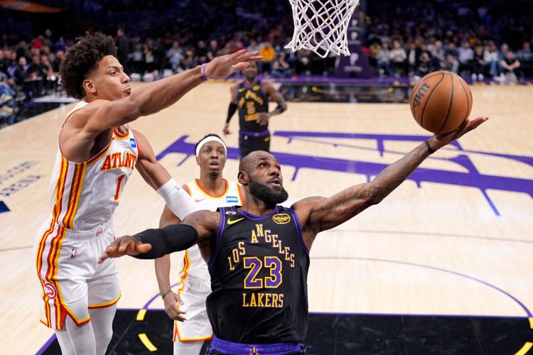 LeBron barely misses triple-double, Luka adds 27 in Lakers' skid ...