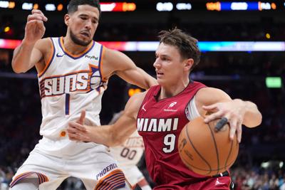 Suns star Devin Booker out against Pistons after injuring ankle in ...
