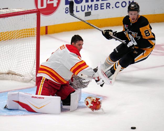 Matt Coronato's 3rd-period goal lifts Flames over Penguins 2-1 ...