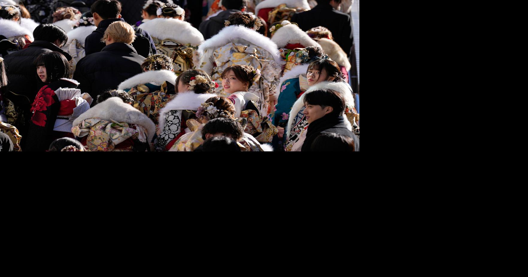 Photos of 20-year-olds gathering in kimonos for Coming of Age Day ...