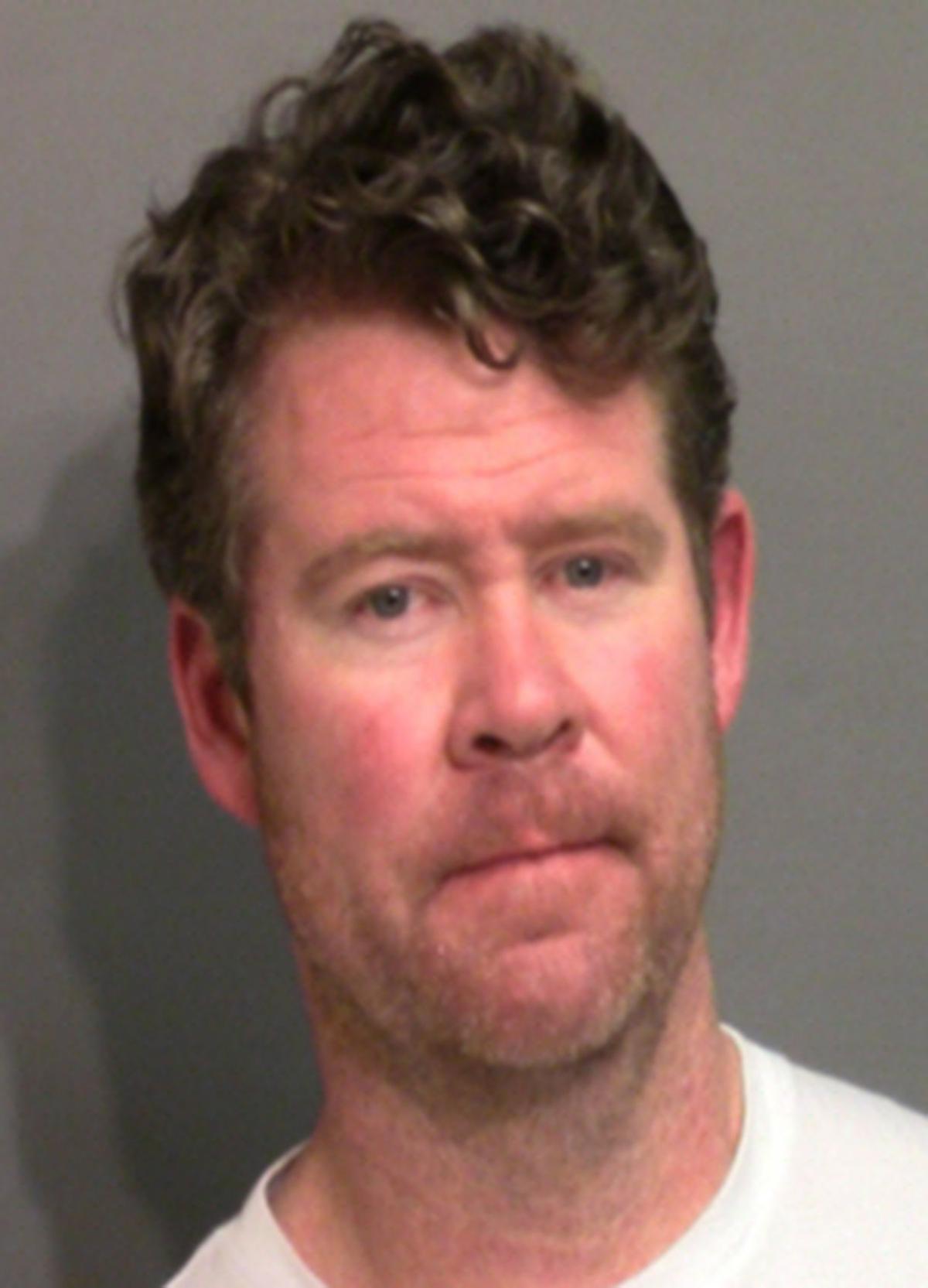 Defense attorney Zeh turns himself in on charges of assault, robbery ...