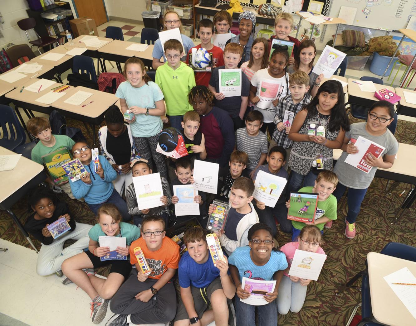 Fifth grade class writes books to send to African children | Local News ...