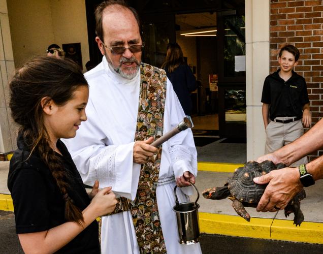 St. Francis Xavier celebrates saint with Blessing of the Pets | Local ...