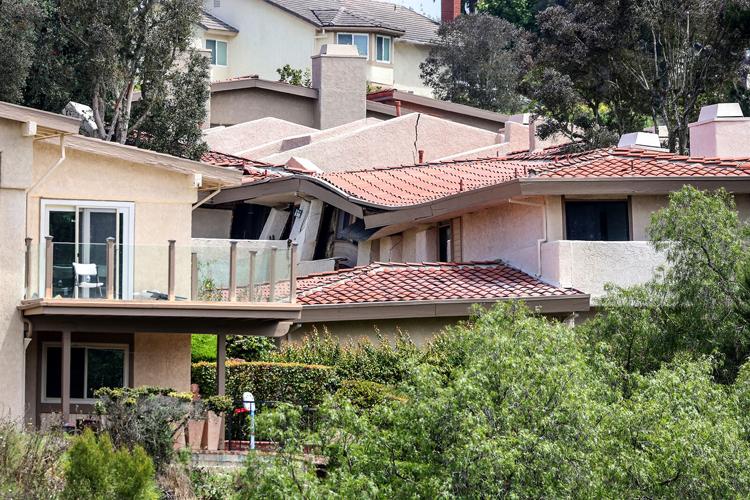 Homes sliding downhill as ground shifts above canyon in Southern ...