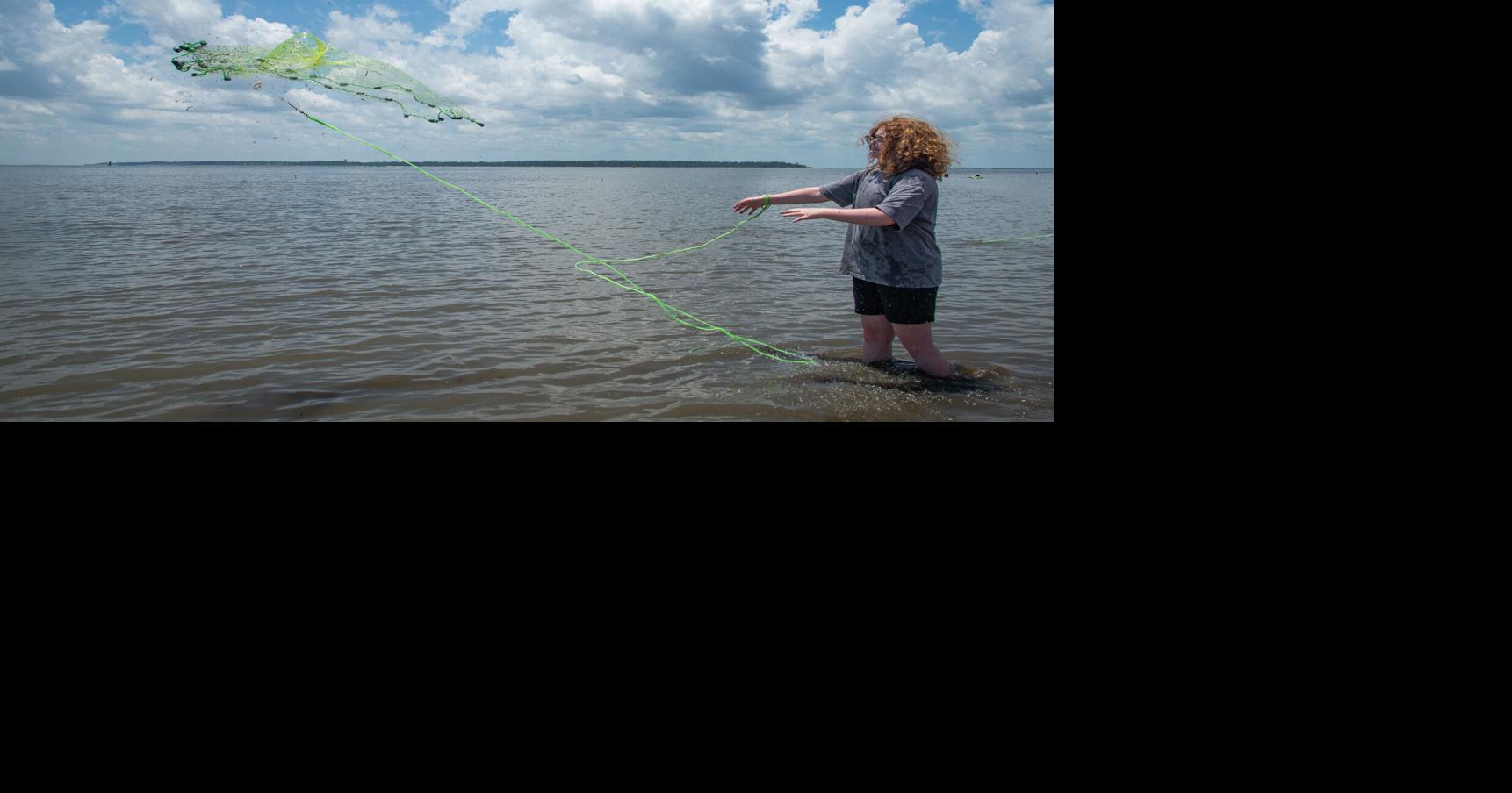 4-H club members learn cast netting and seining to prepare for bait ...