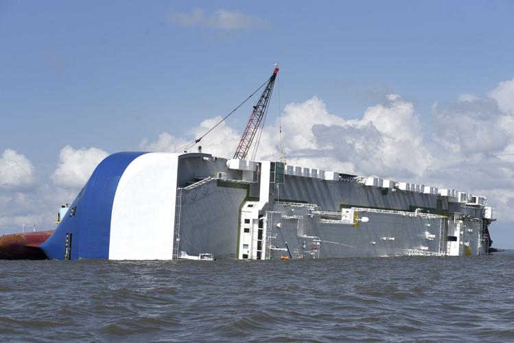 Overturned car ship Golden Ray photographed from a US Coast Guard tour ...