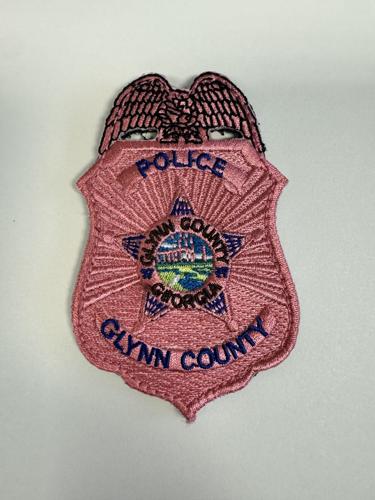 County PD wearing pink badges for breast cancer awareness | Local News ...