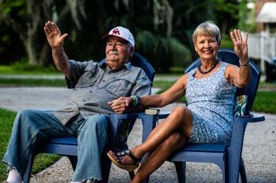 Couple spends school year waving to students | Local News ...