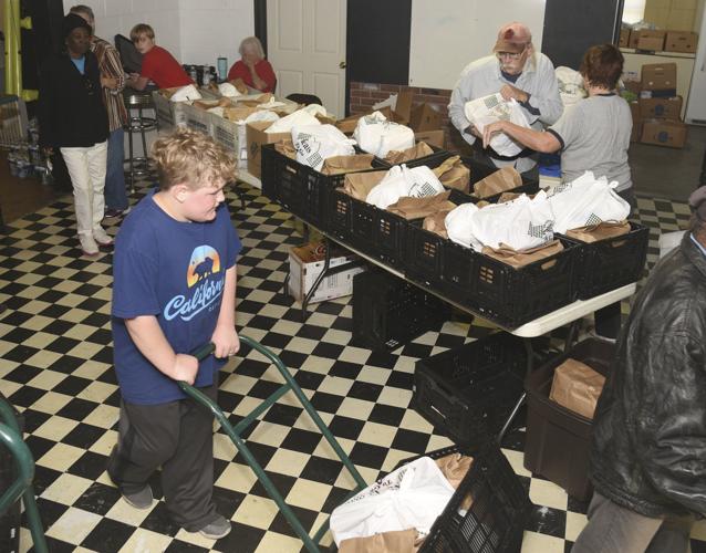 Church food distribution event benefits hundreds | Local News ...