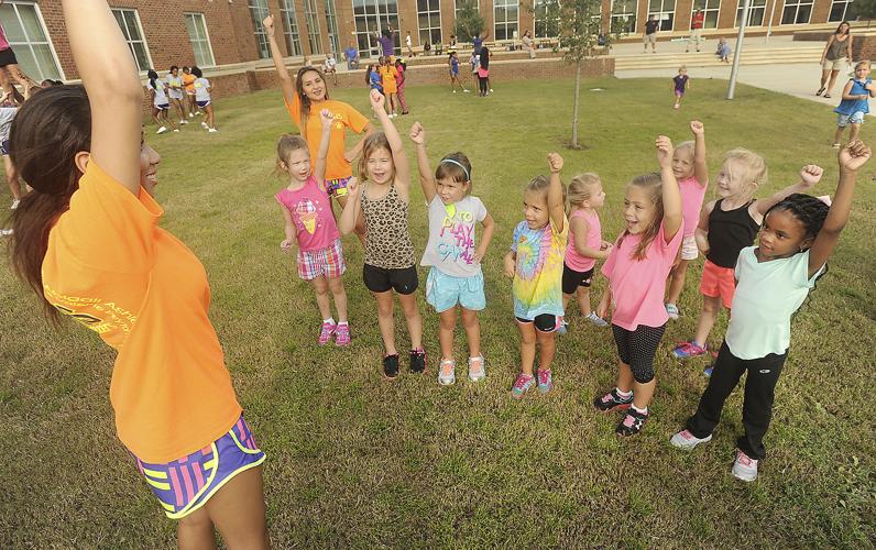 Kids learn cheerleading at camp | Local News | thebrunswicknews.com