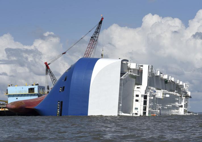 Overturned car ship Golden Ray photographed from a US Coast Guard tour ...