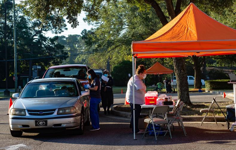 Health department holds drive-thru flu vaccine clinic | Local News ...