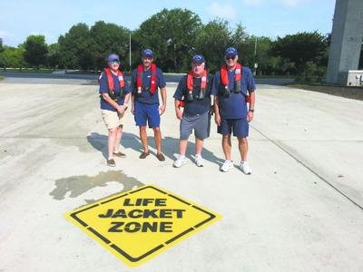 Stencil team creates life jacket signs around island | Community Life ...