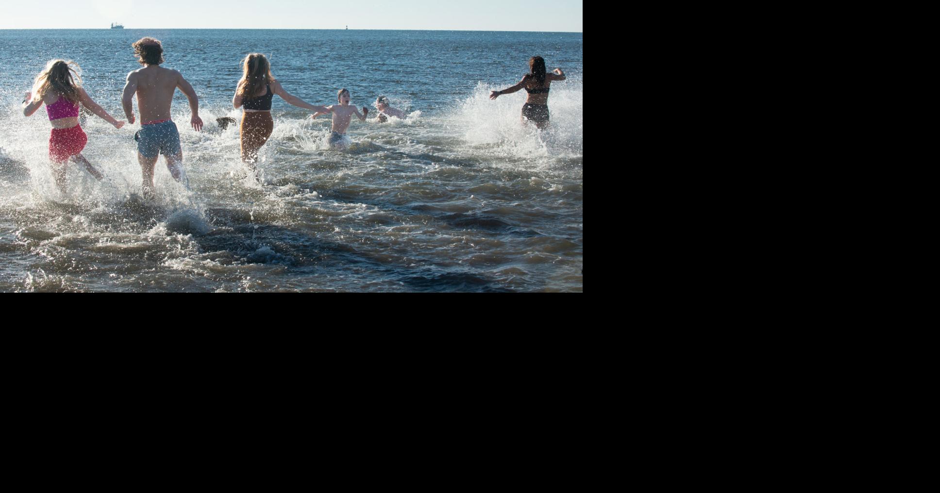 Dozens take the Polar Plunge on New Year's Day | Local News ...
