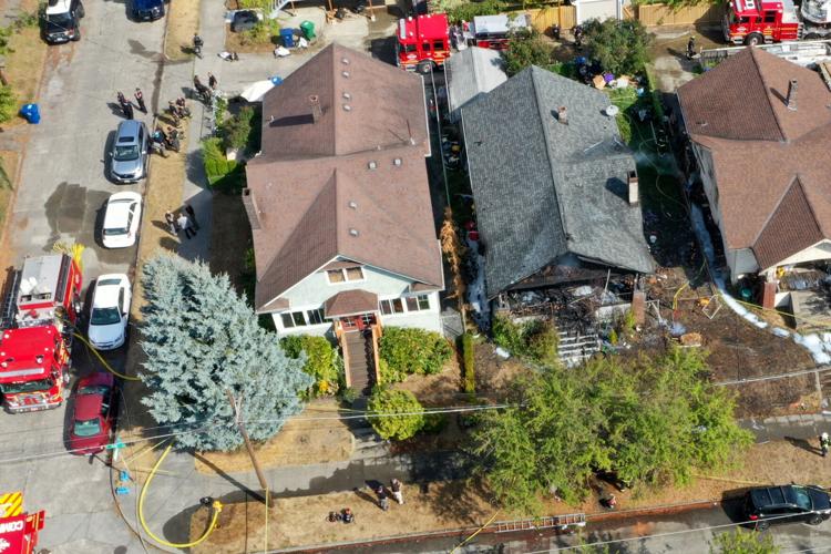 2 adults, 2 children killed in Seattle after fire in barricaded home ...