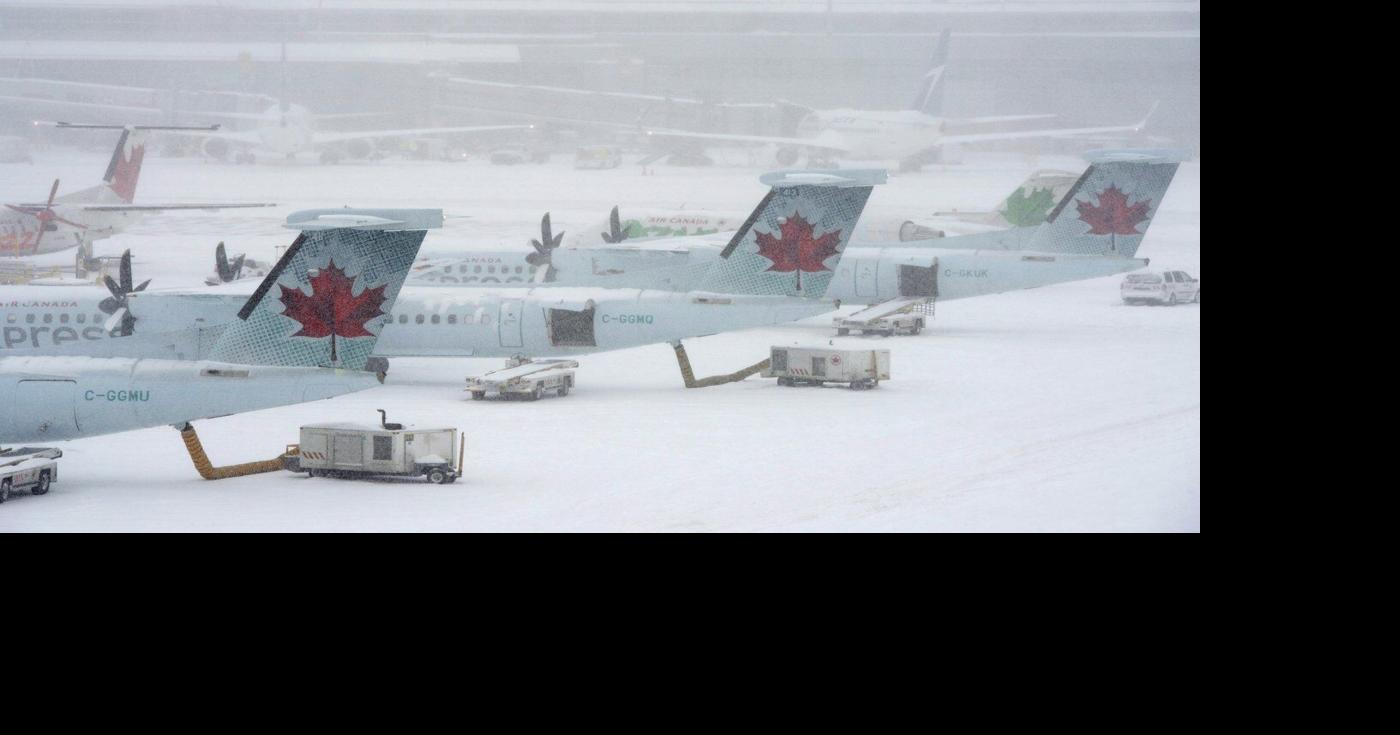 Snowstorm wreaks havoc on air travel plans, as hundreds more flights ...