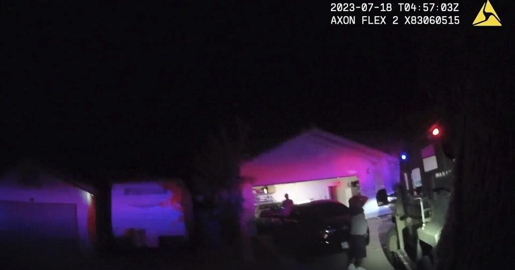Police videos show SWAT officers detaining man, woman during home raid ...