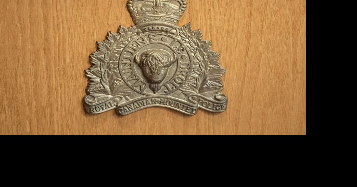 RCMP officers in Langley, B.C., moved out of the way as driver rams ...