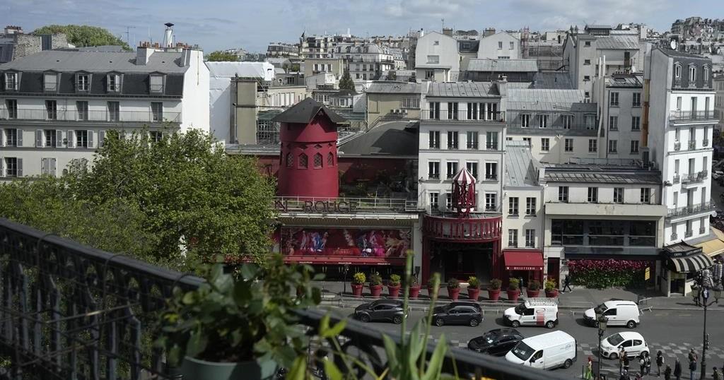 The windmill sails at Paris' iconic Moulin Rouge have collapsed. No ...