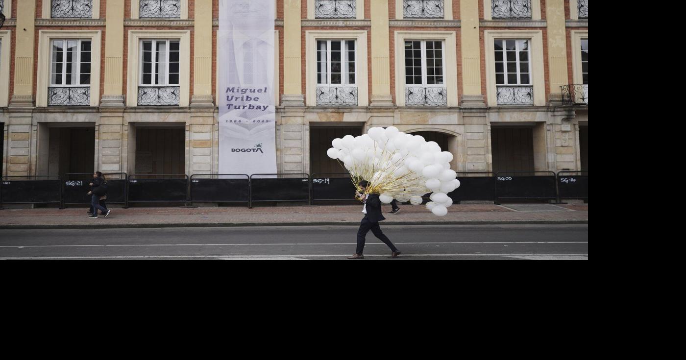 Colombians bid farewell to presidential hopeful Uribe after shooting at ...