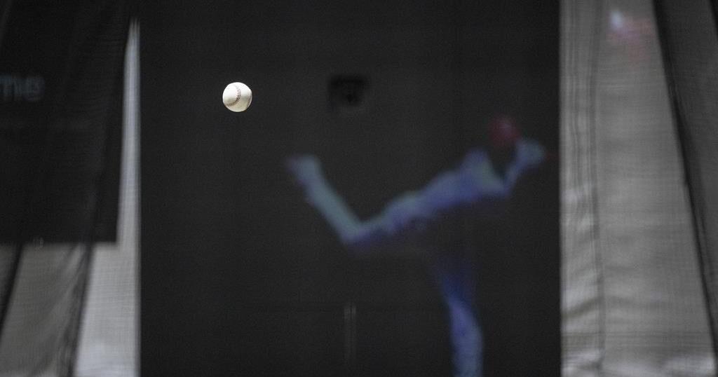 Robots replicate reality: High-tech pitching machine mimics every ...