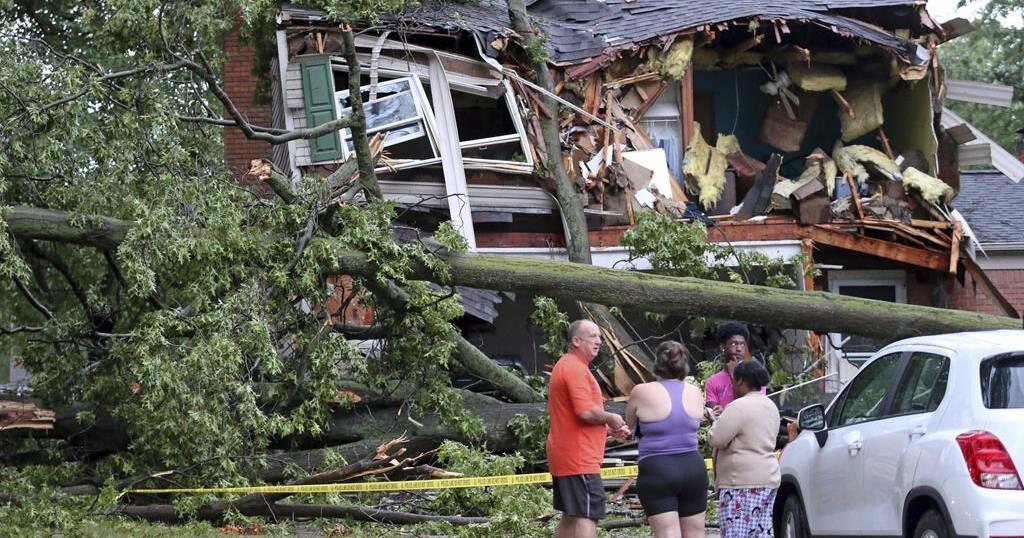 A deadly tornado, flooding rains and swollen rivers plague residents in ...