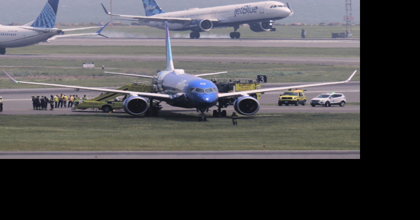 JetBlue flight from Chicago rolls off runway and into grass in Boston ...