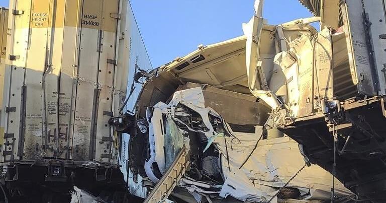 23 freight cars, new vehicles heavily damaged in train derailment in ...