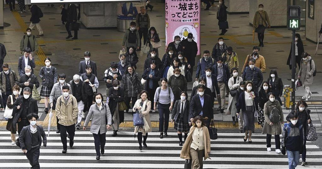 Masks stay put in Japan as 3-year request to wear them ends | Health ...
