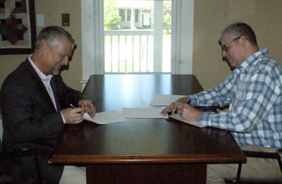 Huff signs contract as Carroll's new superintendent | News ...